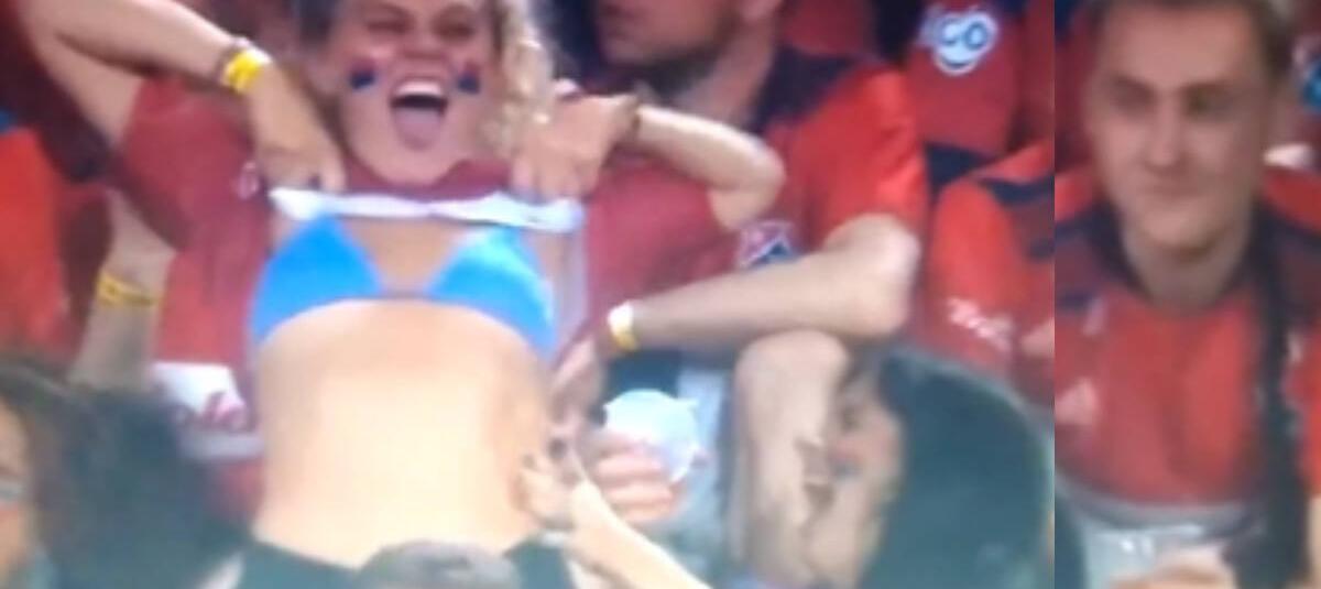 Hincha del Medellín se levanta la camiseta en el estadio Atanasio: video