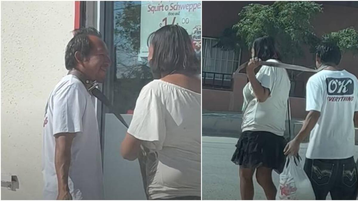 Mujer lleva a su pareja amarrado con una correa por la calle